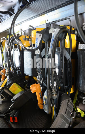 BA sets breathing apparatus in the back of a fire engine tender pump ...
