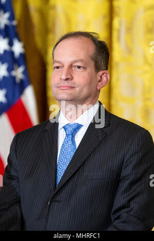 U.S. Secretary of Labor Alex Acosta signs the oath of office following ...