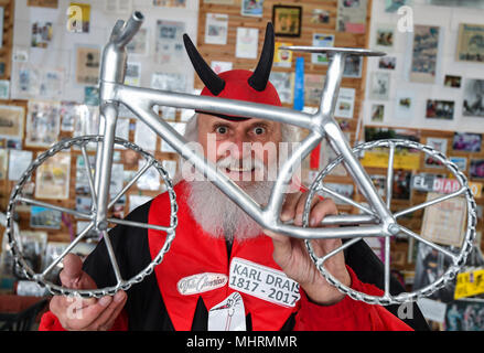 The bike designer Dieter "Didi" Senft posing in front of the Baroque ...