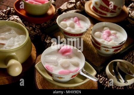 Es Gempol Pleret. Old-fashioned dessert drink of rice balls and flat ...