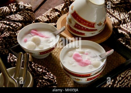 Es Gempol Pleret. Old-fashioned dessert drink of rice balls and flat ...