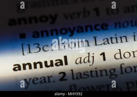 annual word in a dictionary. annual concept Stock Photo - Alamy