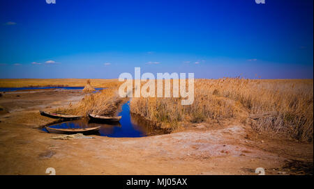 runed Urga fishing village at the shore of Sudochye lake aka part of ...