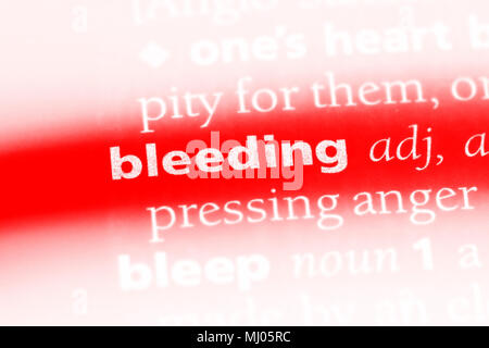 bleeding word in a dictionary. bleeding concept Stock Photo - Alamy