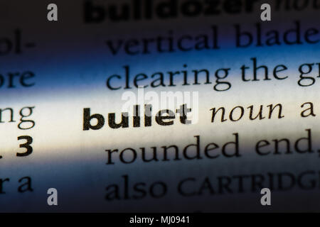 bullet word in a dictionary. bullet concept Stock Photo - Alamy