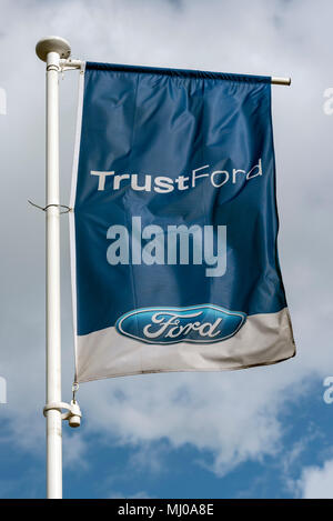 Trust Ford car dealer sign outside garage Stock Photo - Alamy