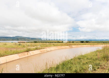 The Tugela-Vaal Water Scheme canal, built in 1995, at the Woodstock Dam ...
