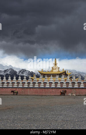 Muya Golden Tower and Yala Snow Mountain under a storm, Tagong, Sichuan ...