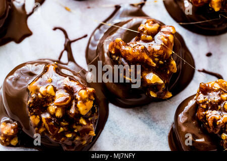 Praline Chocolate with walnut, almond, peanut or croquant. Organic ...