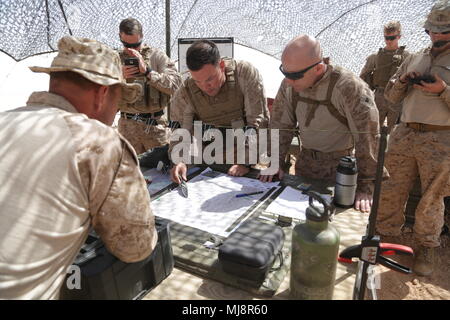 U.S. Marine Corps Col. Farrell J. Sullivan, left, commanding officer of ...