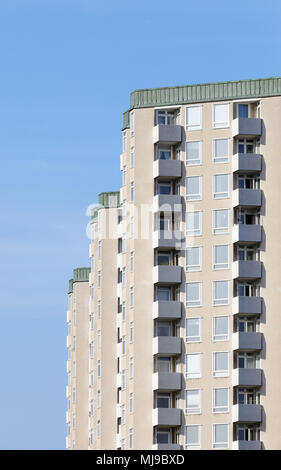 High-rise building with blue sky background Stock Photo - Alamy