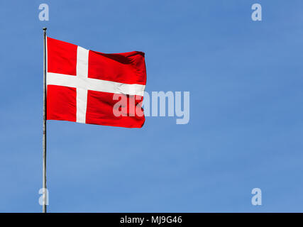 Flag, blue sky and denmark with red and white cross for symbol of ...