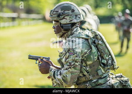 Servicemembers of the British Armed Forces and Royal Thai Army pull ...