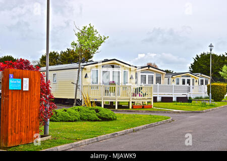 A line of modern static holiday caravans at Trecco Bay Holiday Park ...