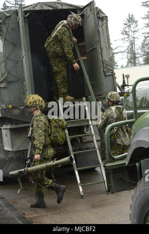 Soldiers assigned to the 39th Canadian Brigade Group hold a defensive ...