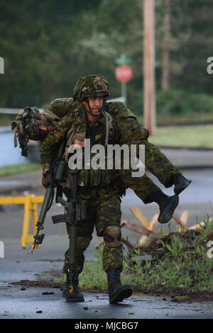 A Soldier assigned to the 39th Canadian Brigade Group holds a defensive ...