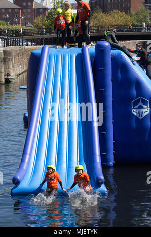 Adventure Dock giant inflatable obstacle course in Dukes Dock which is ...