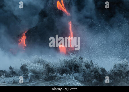 Streams of lava pour into the Pacific Ocean from Kilauea Volcano ...