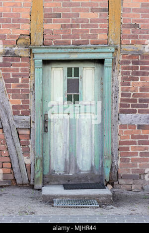 old house with green door in old street of Jakarta, Indonesia Stock ...