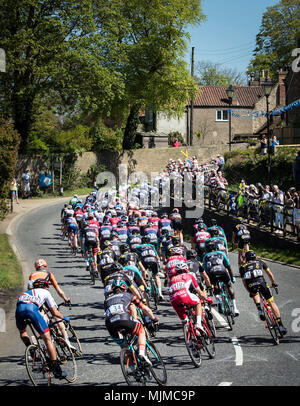 Competitors ride through Scarborough during day three of the Tour de ...