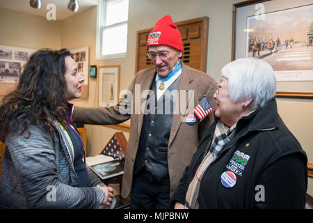 Retired Army Col. Roger H. C. Donlon, right, kisses his wife, Norma, at ...
