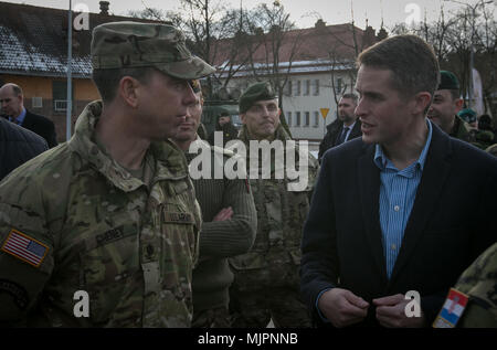 U.S. Secretary of Defense Dick Cheney talks to Spec. James Ferguson ...