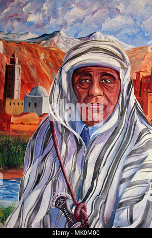 A Moroccan man in his traditional robe makes a visit to the holy place ...