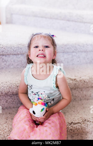 tle girl with her toy in cute pink tutu Stock Photo - Alamy