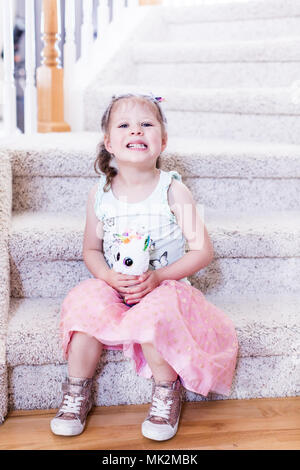 tle girl with her toy in cute pink tutu Stock Photo - Alamy