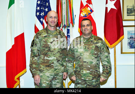 Maj. Gen. Steven A. Shapiro, commanding general, 21st Theater Sustainment Command, presents the ...