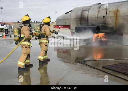 Fire Fighters from the 144th Civil Engineer Squadron's Fire Department ...