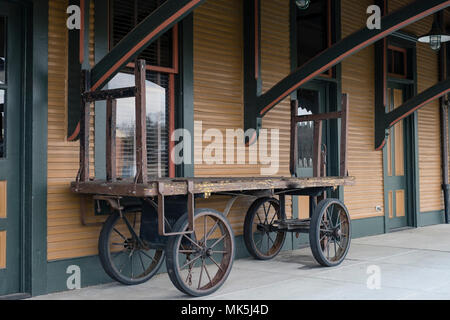 cart or wagon used at a train station to load and haul passengers ...