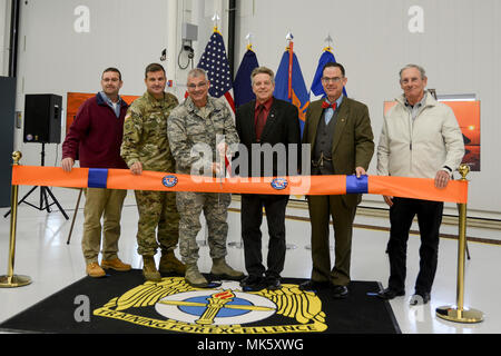 Maj. Gen. Tony Carrelli, Pennsylvania’s adjutant general, cuts the ...