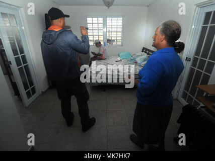 CANOVANAS, Puerto Rico – FEMA Inspector German "Barry" Barreto (left ...