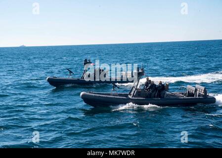 Two 11-meter Navy Special Warfare Rigid Hull Inflatable Boats transit ...