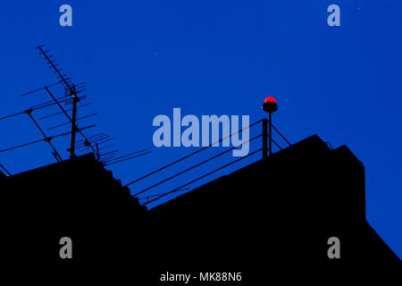 Aircraft warning lights, red flashing lights or signal strobe light on ...