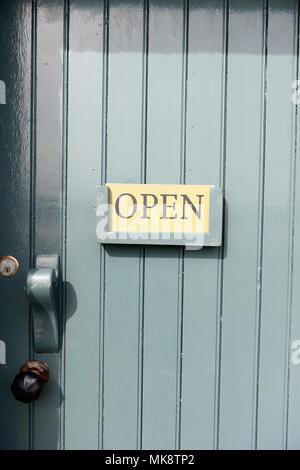 Wooden hand painted open sign on eggshell wooden door Stock Photo - Alamy