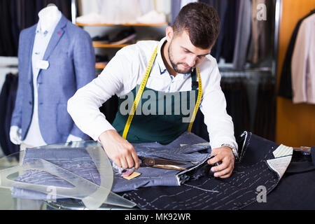happy handsome guy snipper in modern workshop Stock Photo - Alamy
