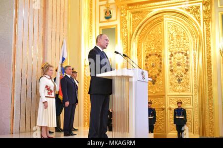 VLADIMIR PUTIN takes the oath as Russian President in May 2000 watched ...