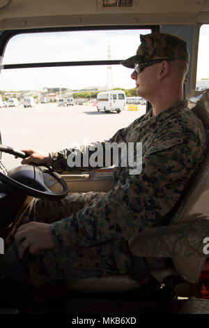 CAMP FOSTER, OKINAWA, Japan – A driver instructor monitors a driver as ...