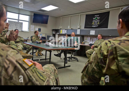 Retired Army Col. Roger H. C. Donlon, right, kisses his wife, Norma, at ...