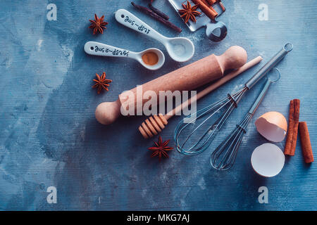 Cooking ingredients and utensils on blue background. Flat lay with copy ...