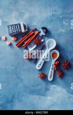 Cooking ingredients and utensils on blue background. Flat lay with copy ...