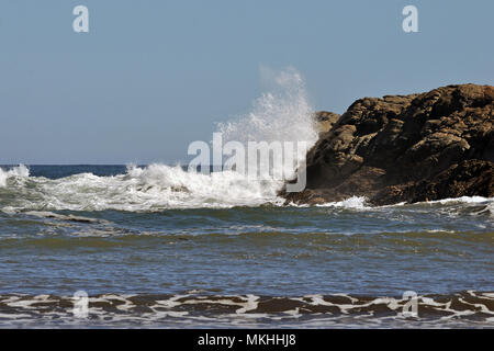 Incoming waves invade Constant Bay on the West Coast of New Zealand ...