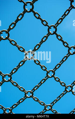 Chains of a soccer goal with blue sky Stock Photo - Alamy
