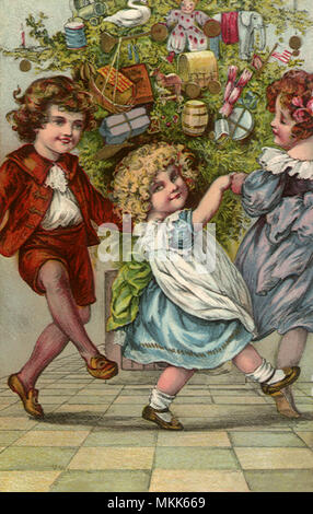Children dancing around a tree Stock Photo - Alamy