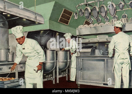 Chefs at work in a kitchen of a restaurant, Paris, 1880s. Colour ...