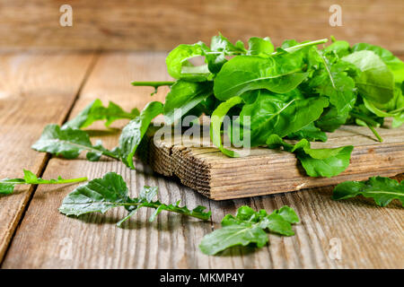 Fresh green home arugula leaves, rucola. Salad Stock Photo - Alamy