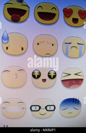 Emoji on computer screen Stock Photo - Alamy