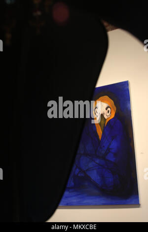 Painting displayed in gallery, viewed from scary angle Stock Photo - Alamy